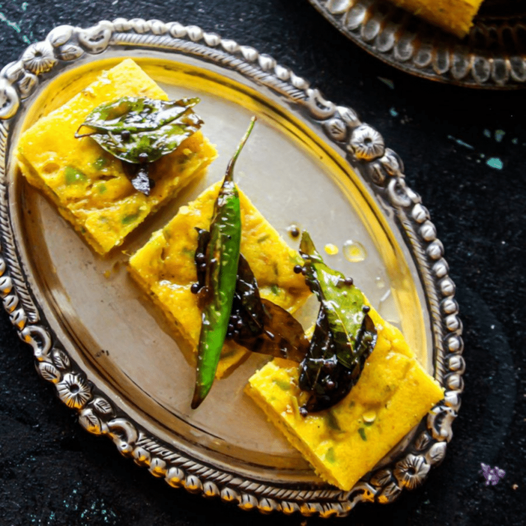 Steamed Khaman Dhokla Indian Savory Cake Recipe - Cooking The Globe